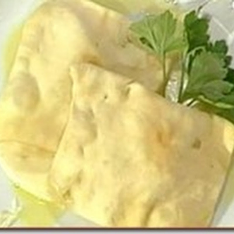 Tirtlen con patate e spinaci su fonduta di alpeggio