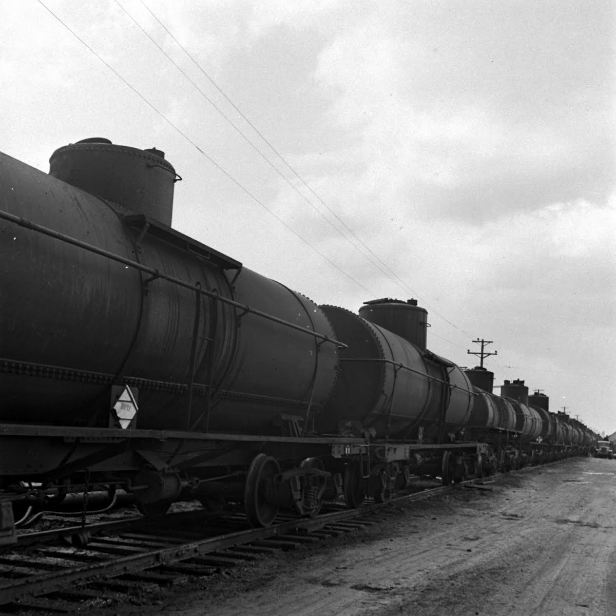 Rr Tank Cars At Nj Esso Plant - George Strock — Google Arts & Culture
