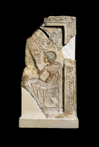 Limestone stela with a seated figure of Akhenaten — Google Arts & Culture