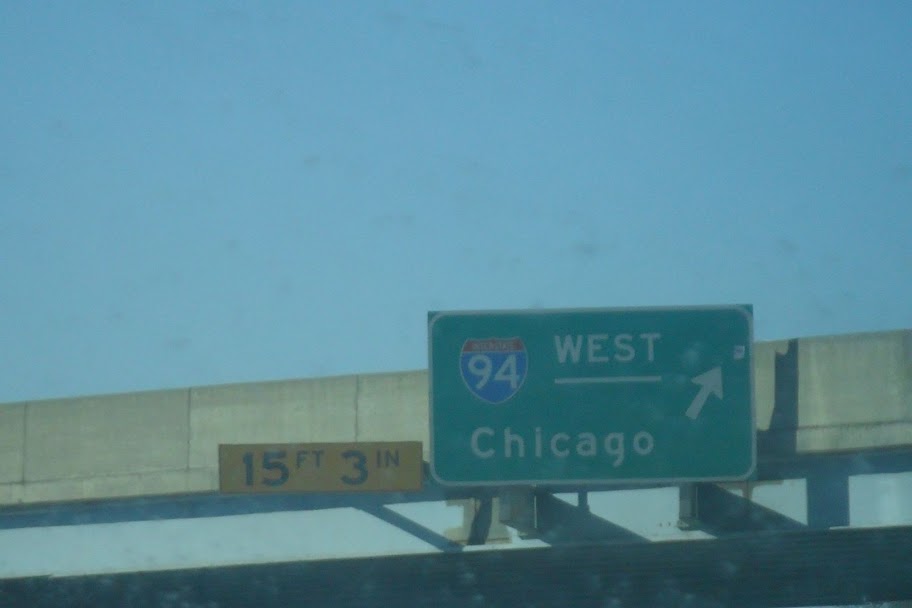 Old freeway signs with underlined cardinal directions I saw
